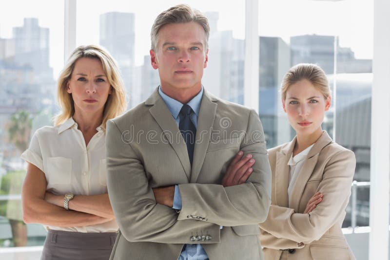 Three Business People Standing Together Stock Photo - Image of ...