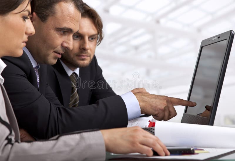 Three Business People Working Stock Photo - Image of consulting ...