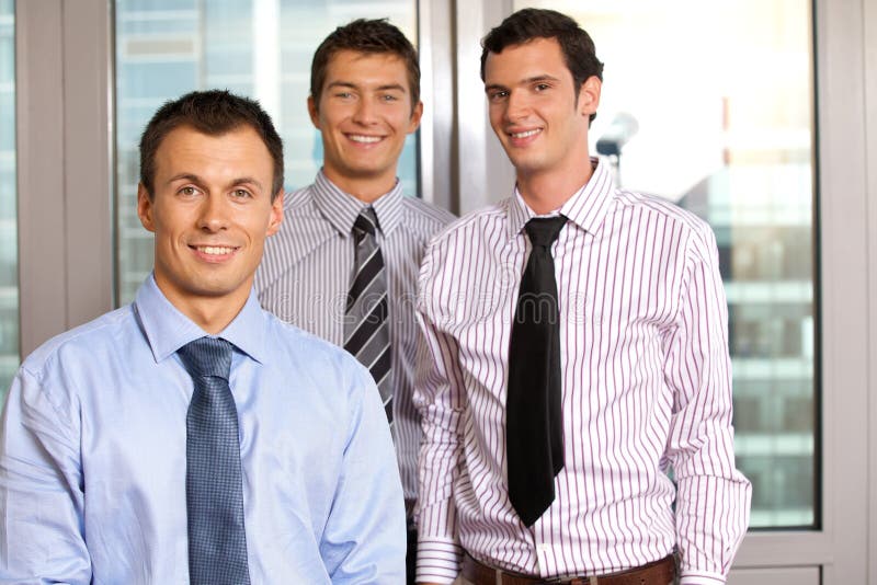 Three Businessmen Smiling at Office, Portrait Stock Photo - Image of ...