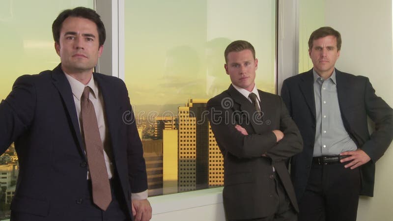 Three Businessmen Standing by Window in Office Stock Footage - Video of ...