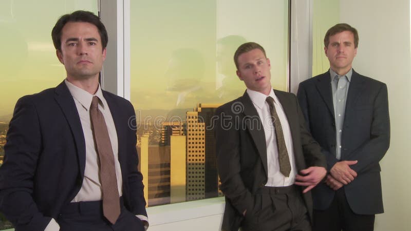 Three Businessmen Standing by Window in Office Stock Video - Video of ...