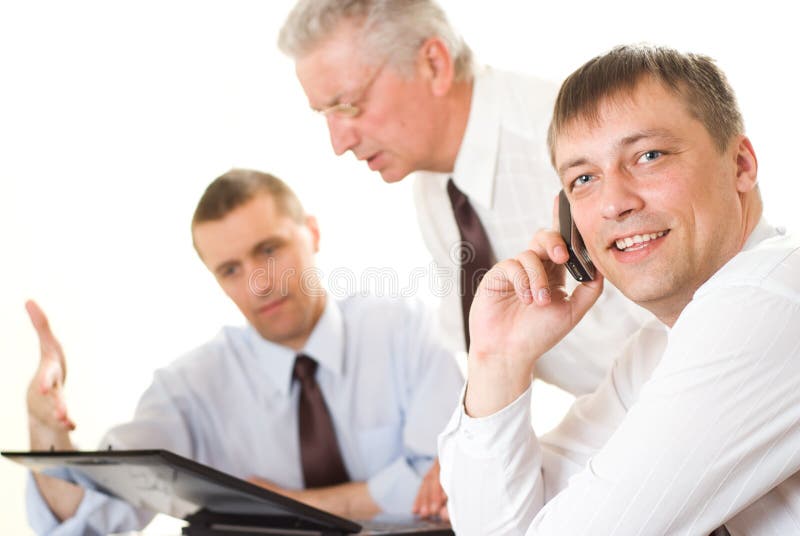 Three businessmen working stock photo. Image of elderly - 14512686