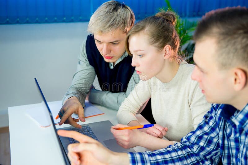 Three Businesspeople with Computer Stock Image - Image of profession ...