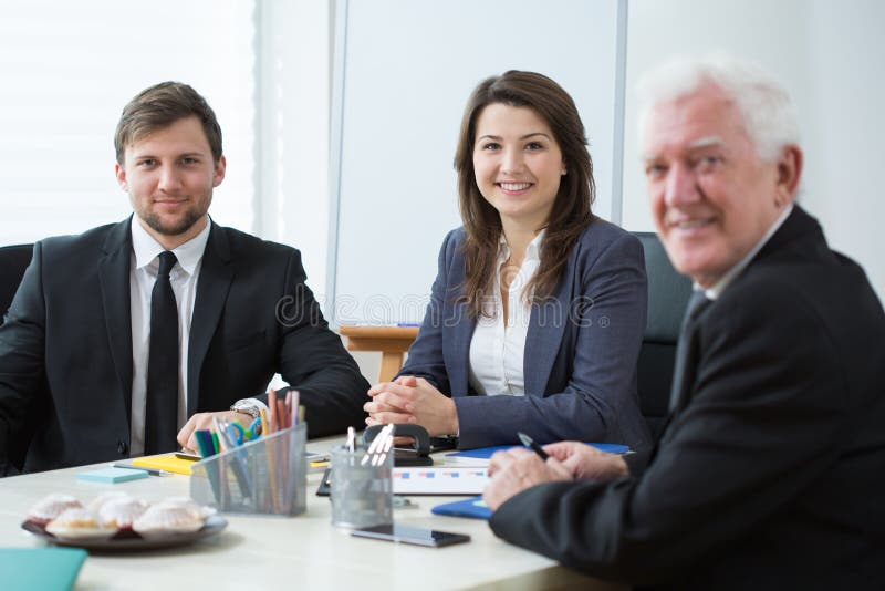 Three businesspeople stock image. Image of meeting, busy - 50099049