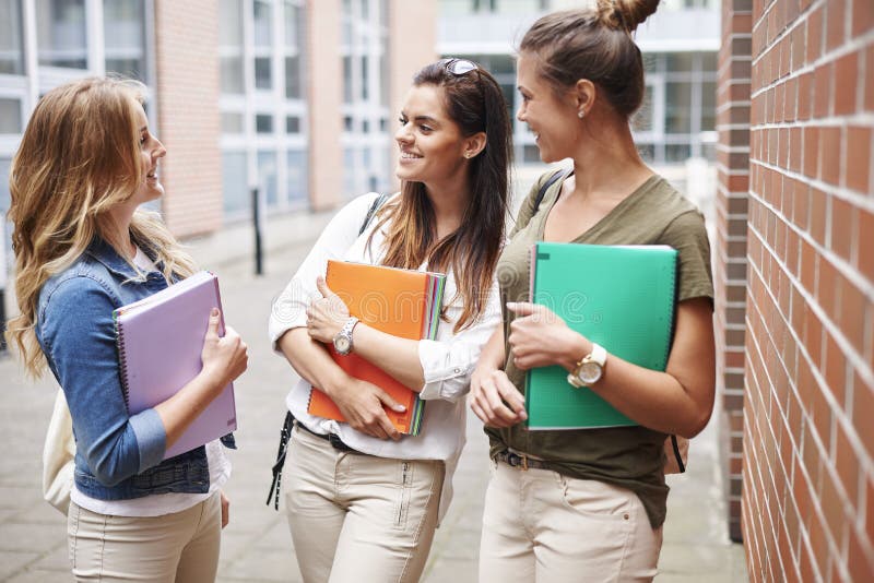 Three Busy Students on Campus Stock Image - Image of people, meeting ...