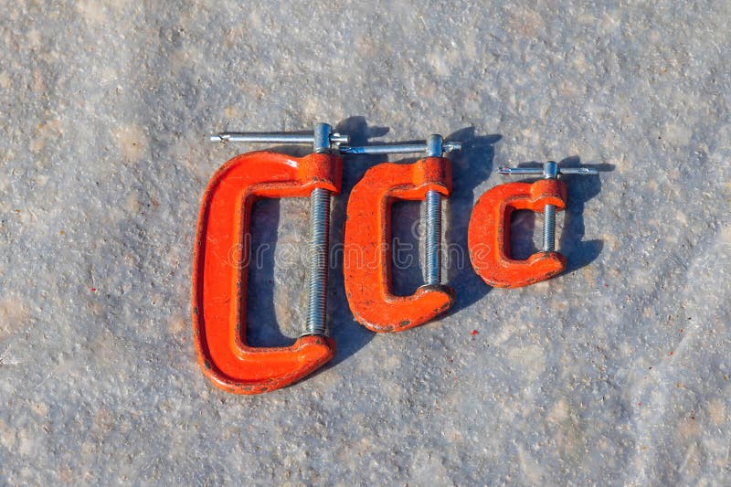 Three C Shaped Clamps stock image. Image of industry - 360956413