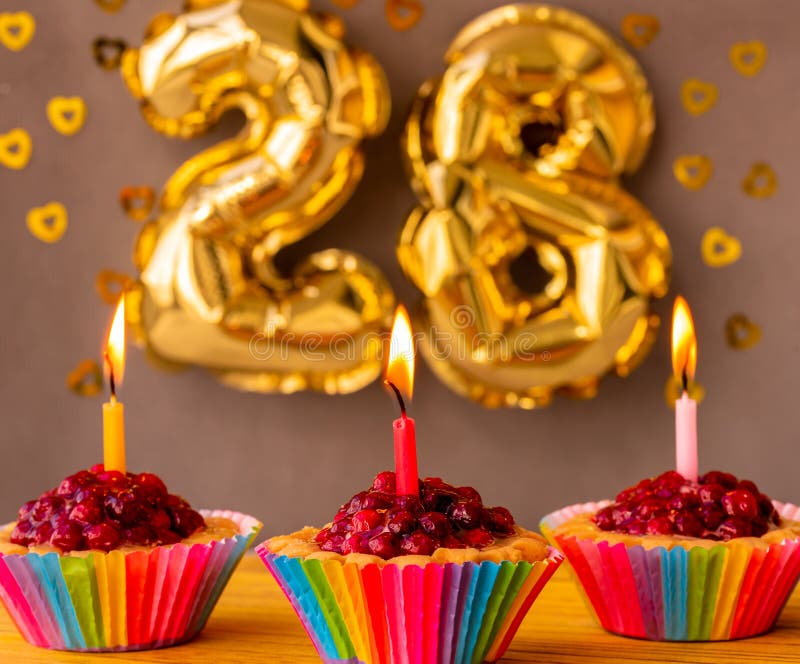 Three Cakes-baskets with Candles on the 28th Birthday Stock Image ...
