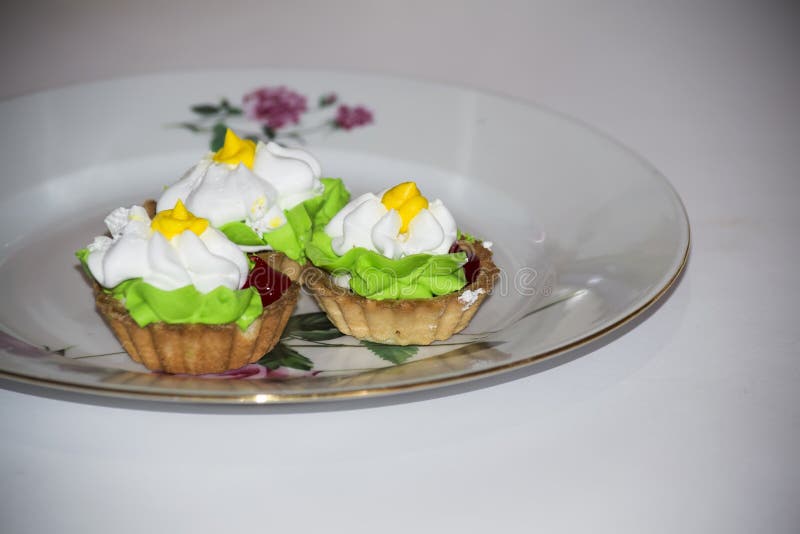 Three cakes on a plate stock photo. Image of dish, baked - 171365908