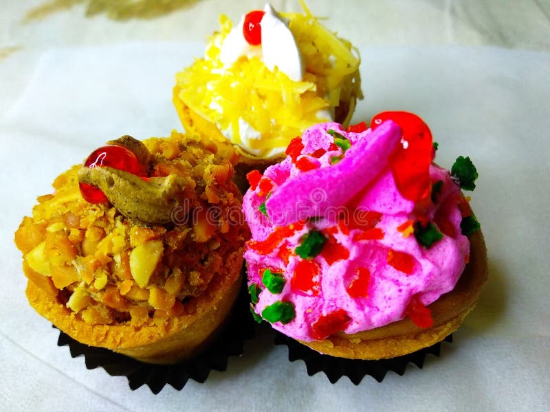 Three Cakes of Various Colors Stock Photo - Image of strawberry, lunch ...