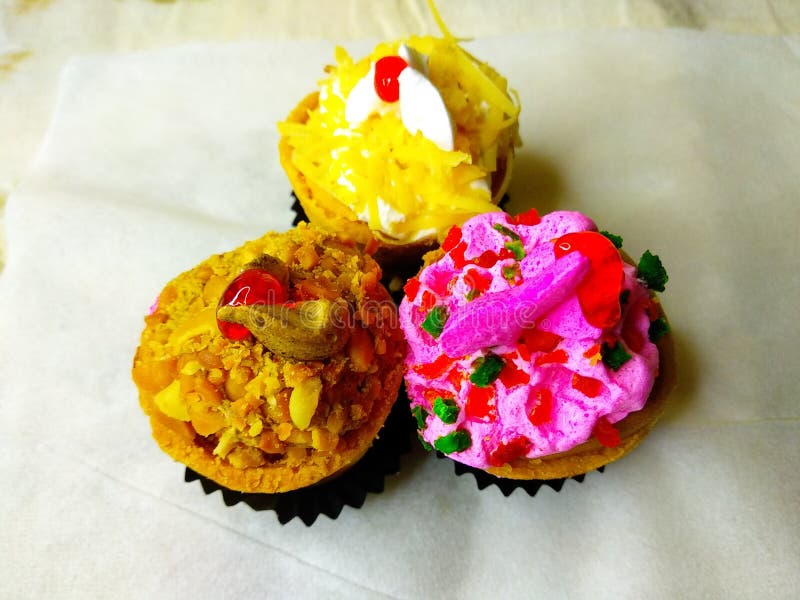 Three Cakes of Various Colors Stock Photo - Image of dairy, meat: 237807372