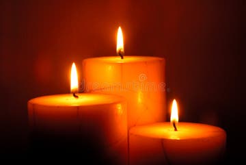 Three candles stock photo. Image of dark, light, bright - 1477184