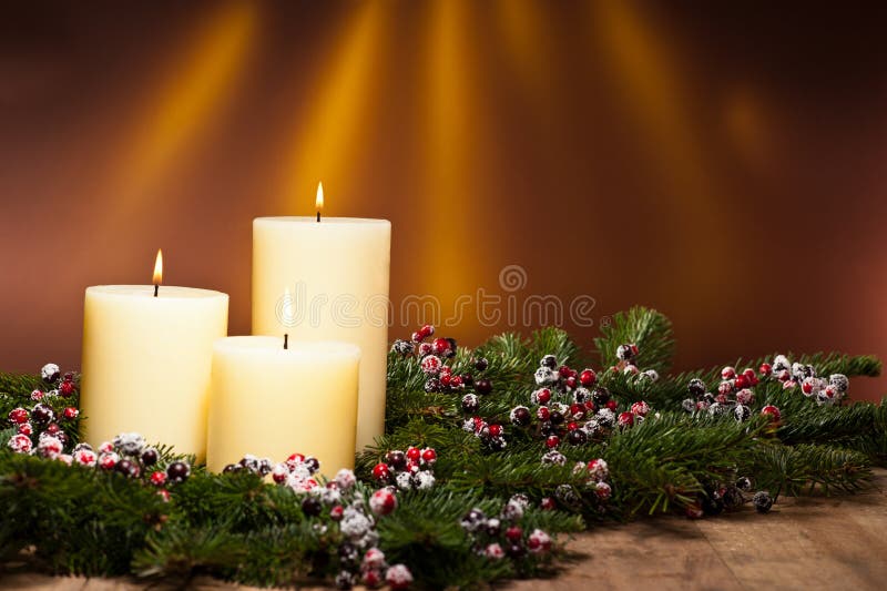 Three Candles in an Advent Flower Arrangement Stock Image - Image of ...