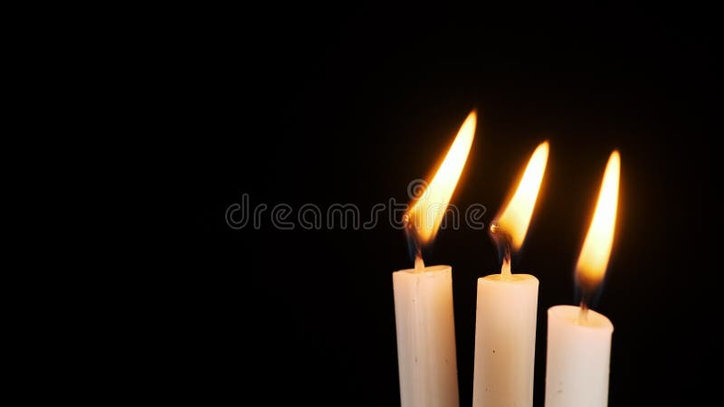 Three Candles Burning and Extinguished on a Black Background, Copy ...
