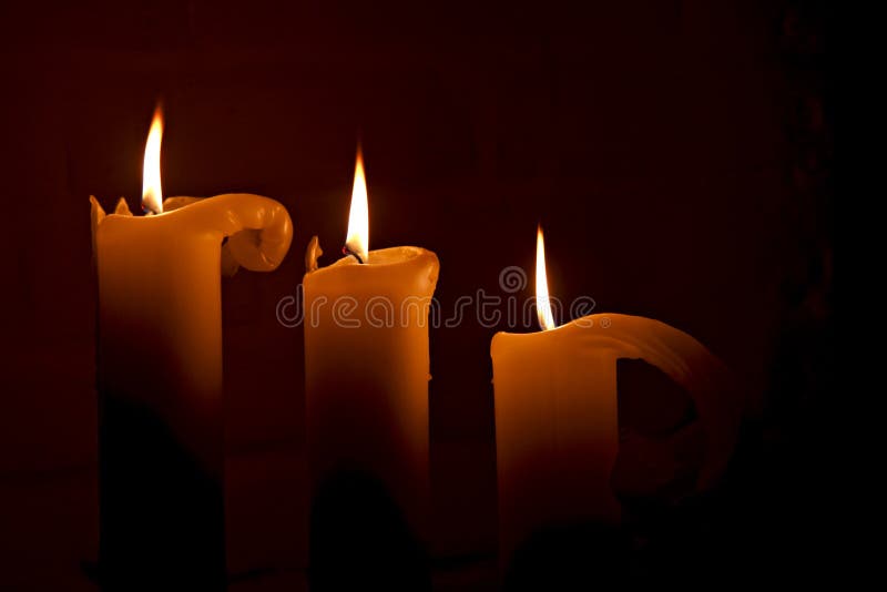 Three Candles stock image. Image of dark, burning, candles - 99844595