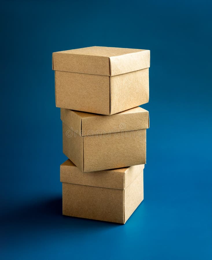 Three Cardboard Parcel Boxes Stack on Blue Background, Vertical Style ...