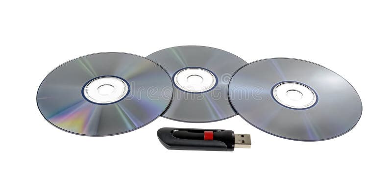 Three CDs and High Capacity USB Flash Drive on White Stock Image ...