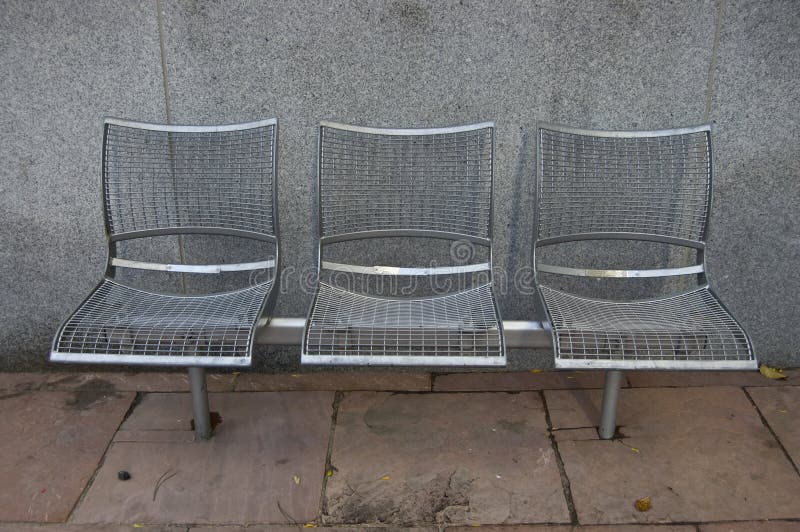 Three Chairs stock image. Image of mesh, chairs, outdoors - 7517695