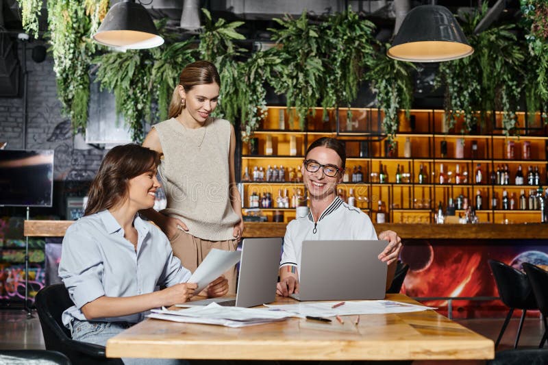 Three Cheerful Hardworking Team in Smart Stock Photo - Image of ...