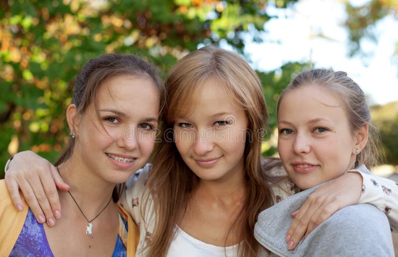 Three Cheerful Student Girls Stock Photo - Image of hugging, common ...