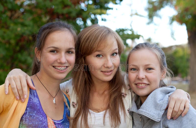 Three Cheerful Student Girls Stock Image - Image of green, friend: 22707167