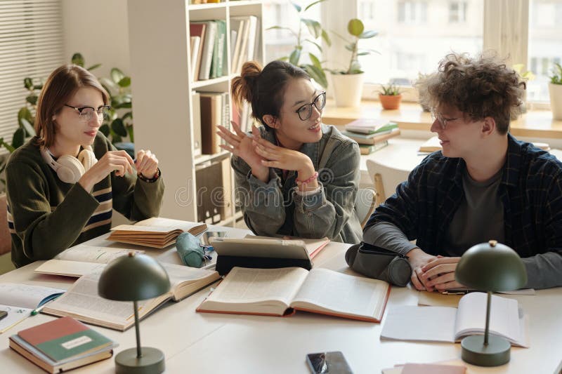 Three Cheerful Students Group Study Session University Library Stock ...