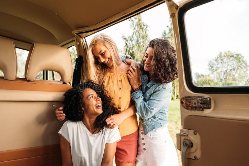 Three Cheerful Women Having Fun during Road Trip Stock Photo - Image of ...