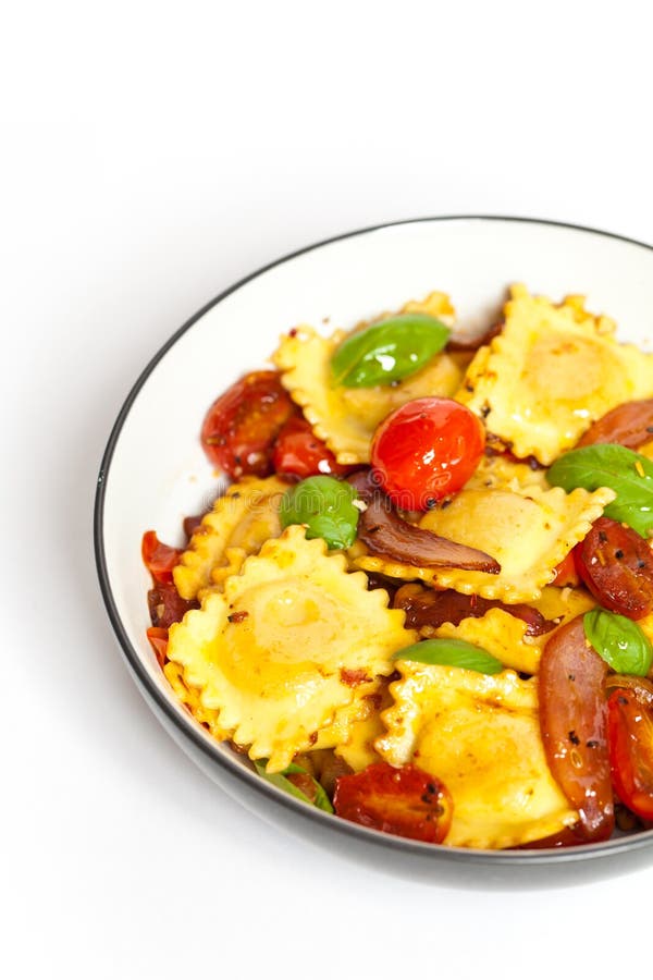Three Cheese Ravioli with Tomato Stock Image - Image of plate, green ...