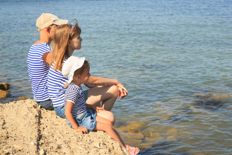 Three Children on the Beach Stock Photo - Image of sand, beach: 122029040