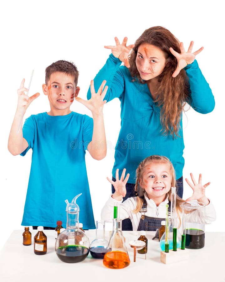 Three Children Doing Experiments with Chemical Liquids at the Lesson ...