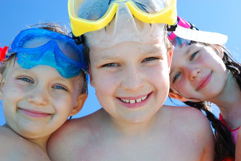 Three Children With Goggles Stock Image - Image of faces, smile: 2632709