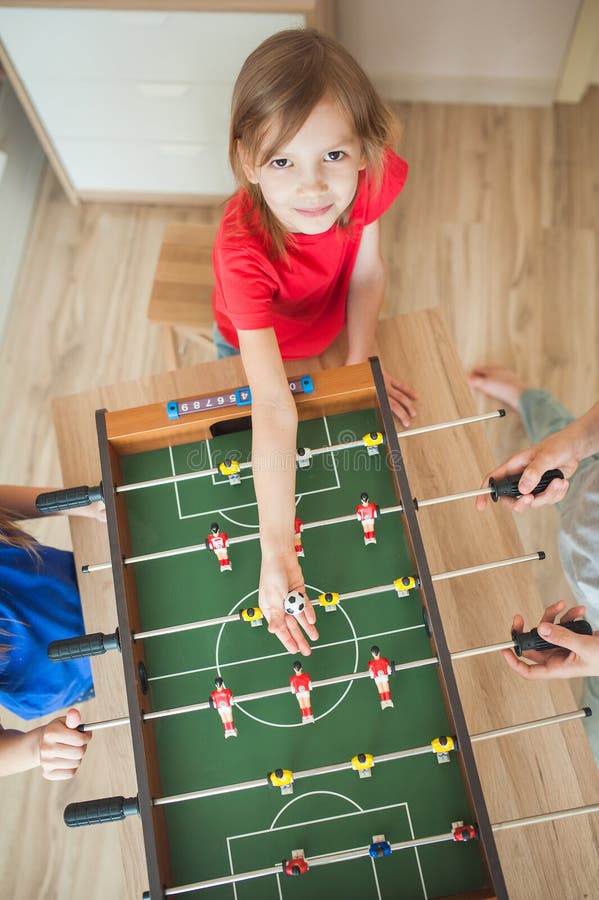 Three Children Play Table Football, Top View Stock Image - Image of ...