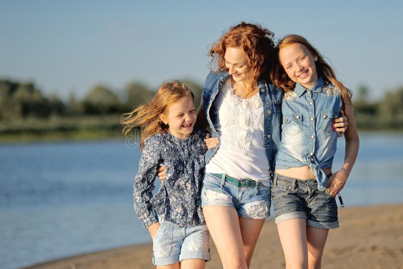 Three Children Playing on Beach Stock Photo - Image of adorable, happy ...