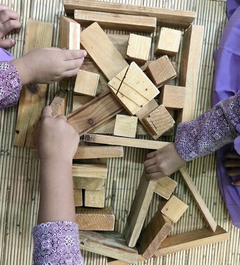 Children Playing with Wooden Blocks for Creativity and Motor Skills ...
