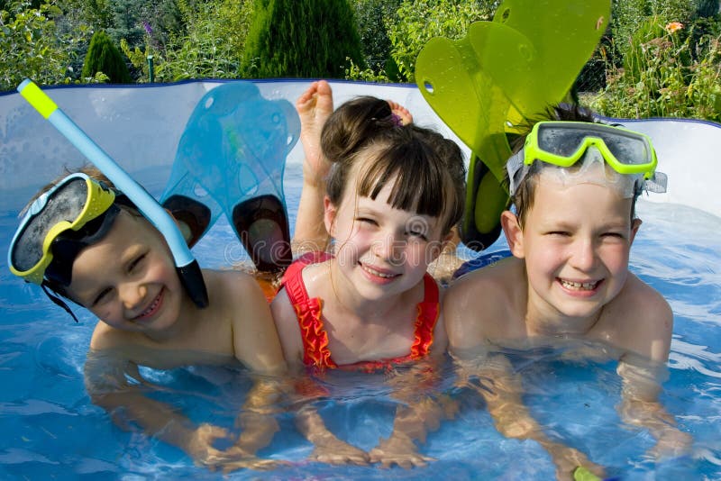 Children in swimming pool stock photo. Image of children - 2674302