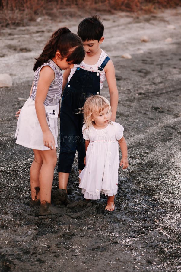 Three Children Running Along Beach Stock Image - Image of active ...