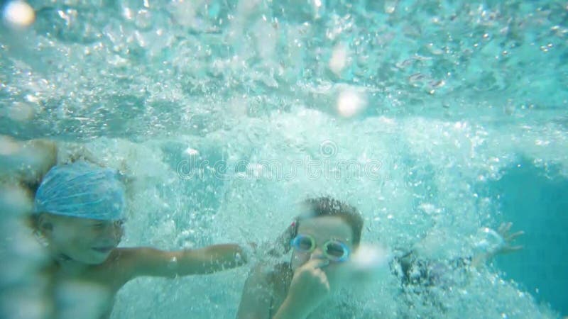 Three Childrens Jumping into the Pool with Clear Stock Footage - Video ...
