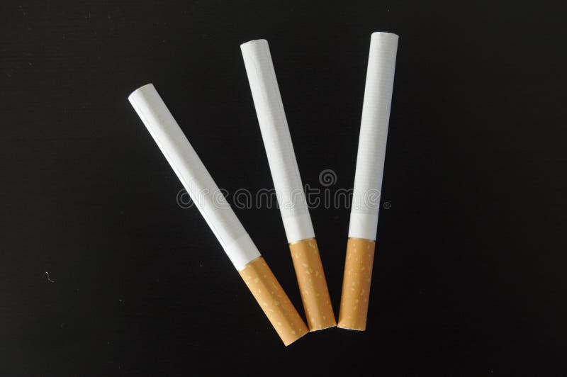 Three cigarettes stock image. Image of filter, cigarettes - 12785457