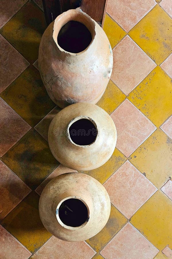 Three Clay Pots on a Checkered Floor Stock Photo - Image of style ...