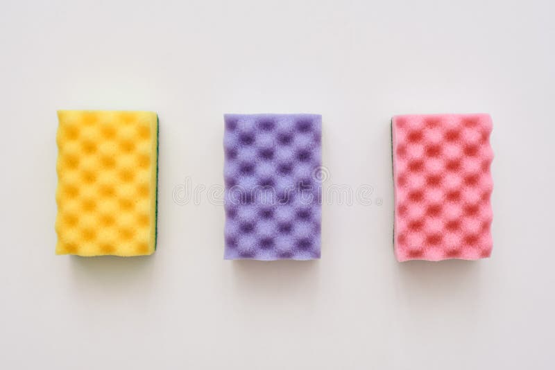 Three Cleaning Sponges Isolated. Yellow,pink and Purple Cleaning ...
