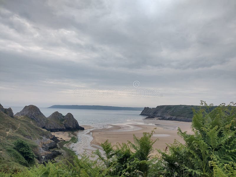 Three Cliff& x27;s Bay stock photo. Image of wales - 287559906