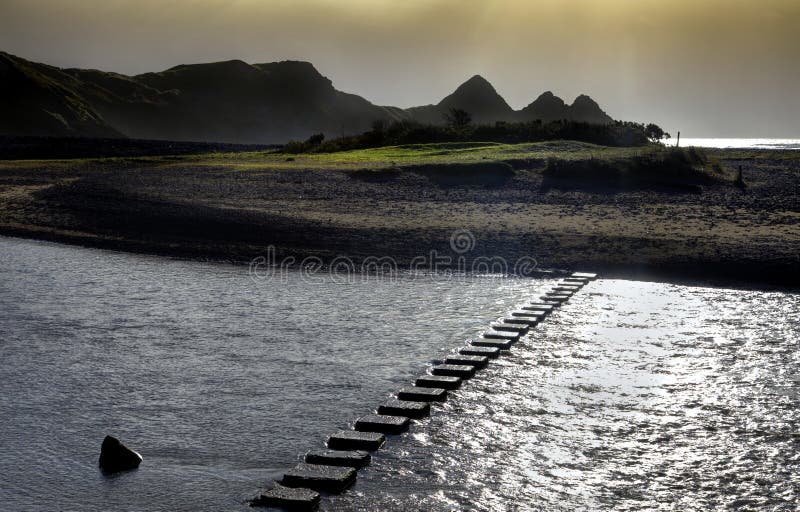 Stepping stones stock image. Image of cliffs, bank, three - 69795451
