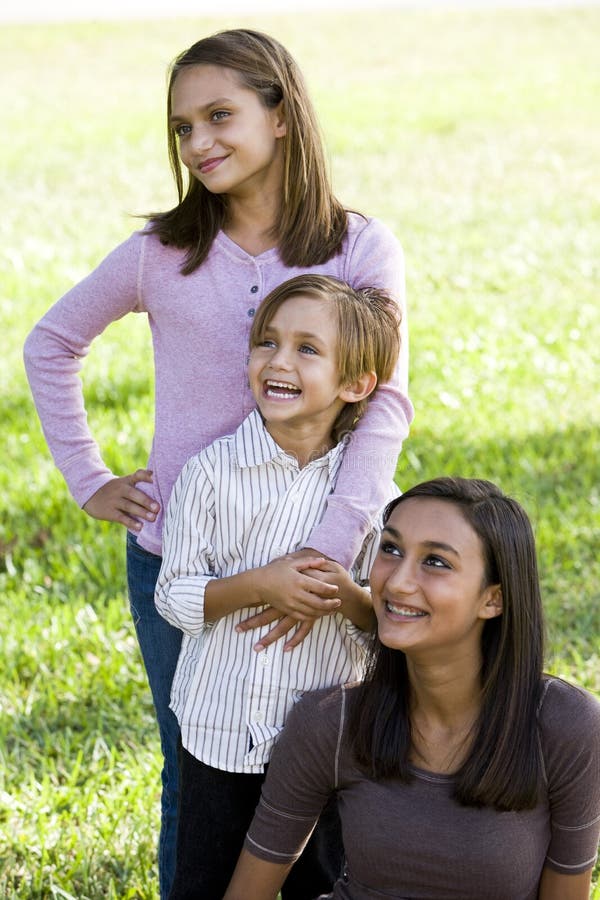 Three Close Siblings Together Outdoors Stock Photo - Image of teenage ...