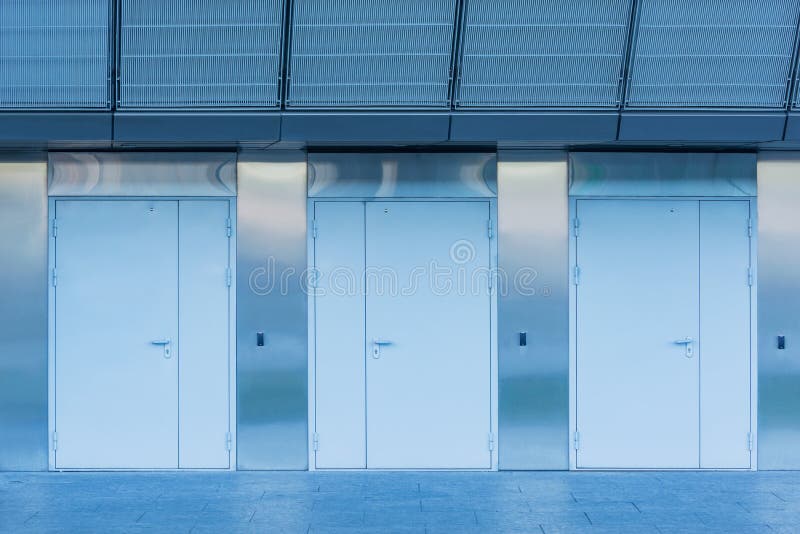 Three Closed Doors of the New Building Stock Image - Image of ...