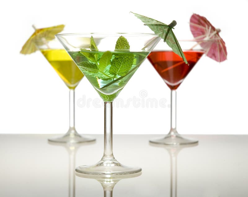 Three Cocktails with Umbrellas Stock Photo - Image of drink, spirits ...