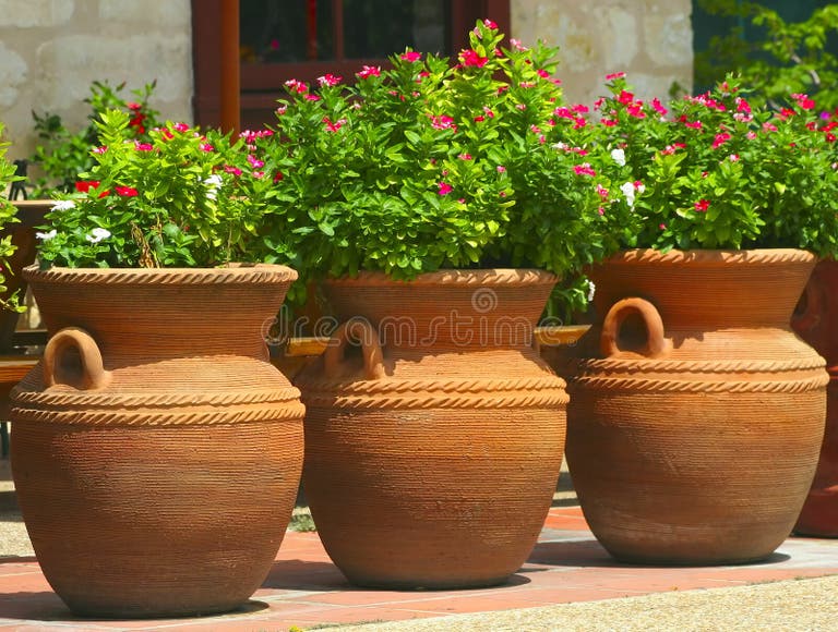 Three Coiled Clay Pots 2 stock image. Image of container - 1093563
