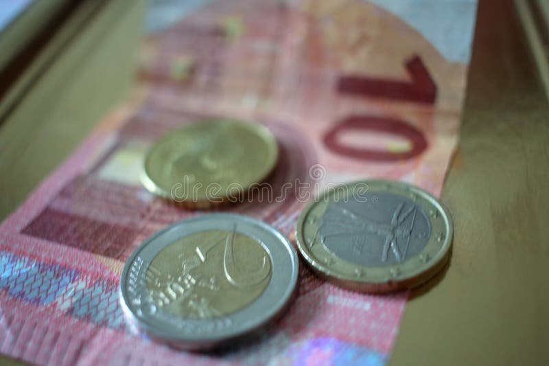 Three Coins and a Bank Note Stock Image - Image of money, concepts ...