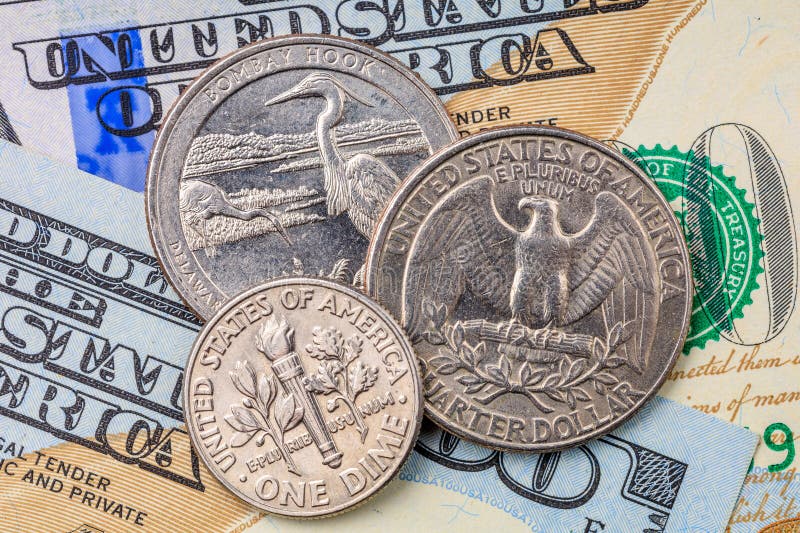 Three Coins on Top of a Dollar Bill Stock Photo - Image of coins, white ...