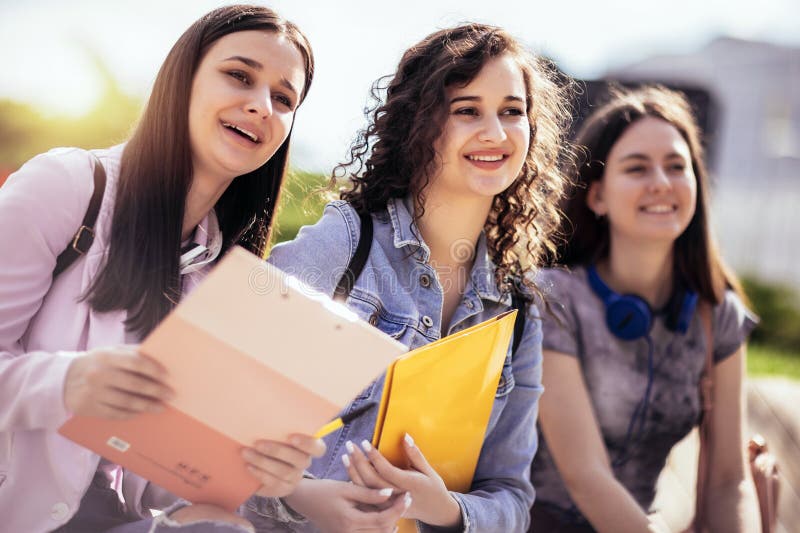 Collage Girls Sitting on Bench and Studying for School Stock Image ...