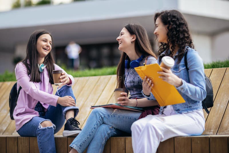 Three Collage Girls Studying Outside Stock Photo - Image of gossip ...
