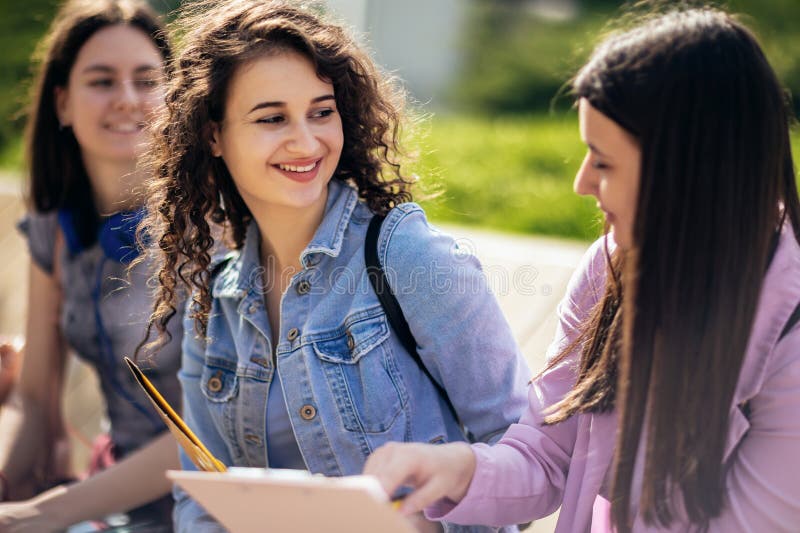 Three Collage Girls Studying Outside Stock Image - Image of collage ...